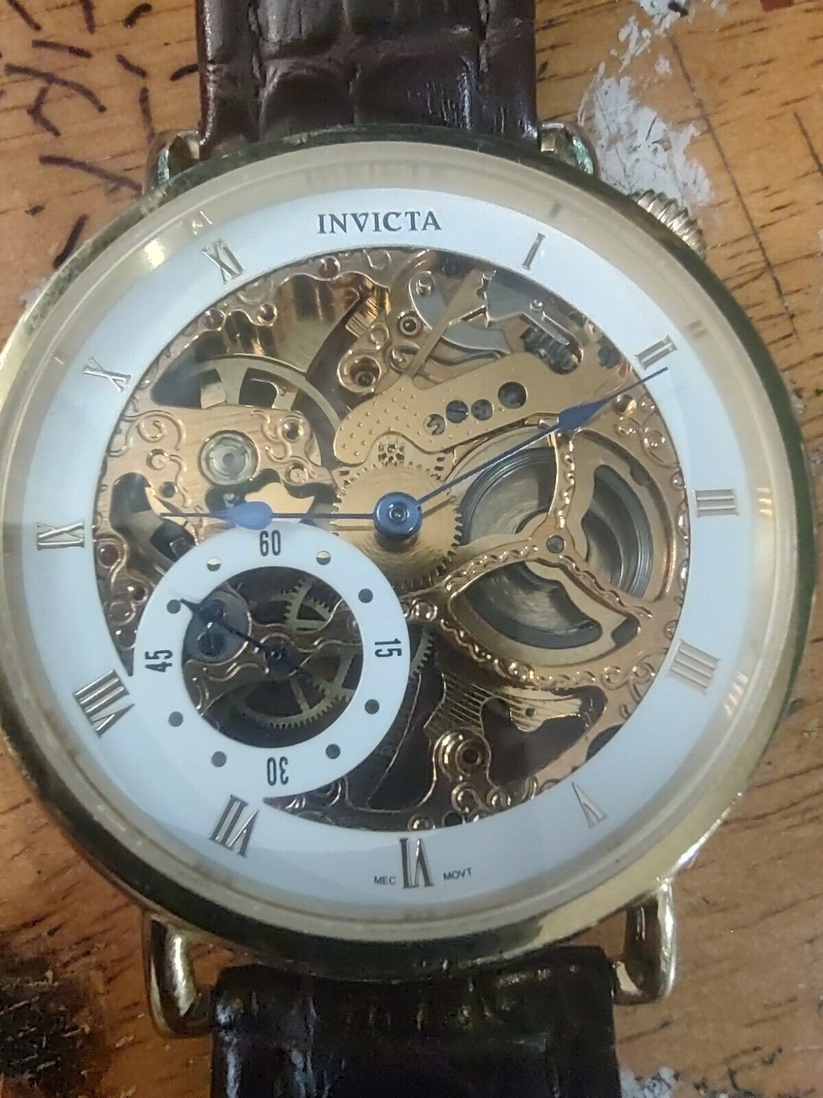 Elegant Vintage Invicta Gold Skeleton Watch