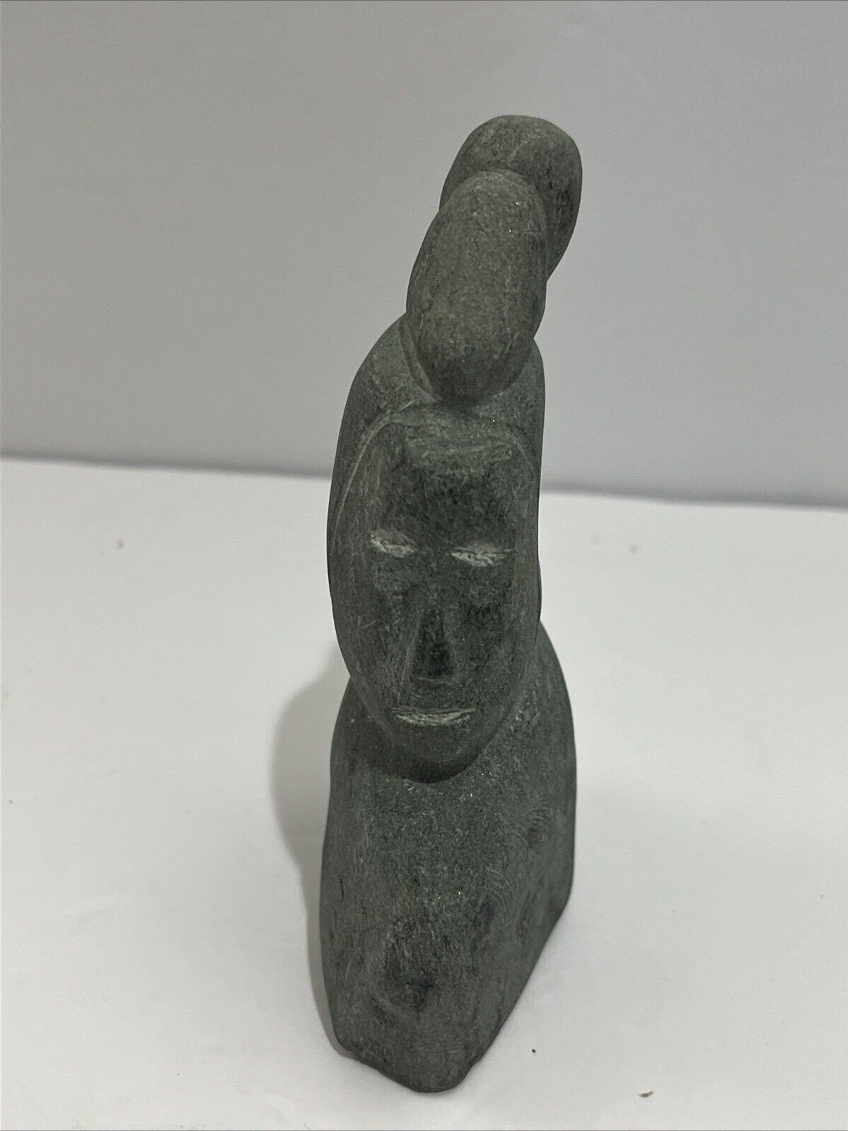 Unique Many Faced Man Stone Sculpture by Johnny Iquliq